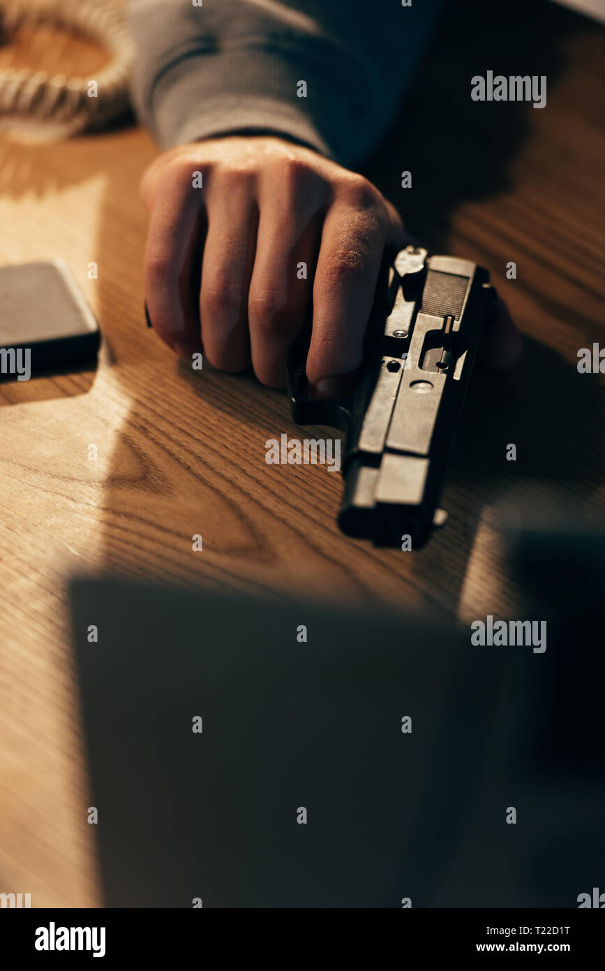 Hand gun on table hi-res stock photography and images - Alamy