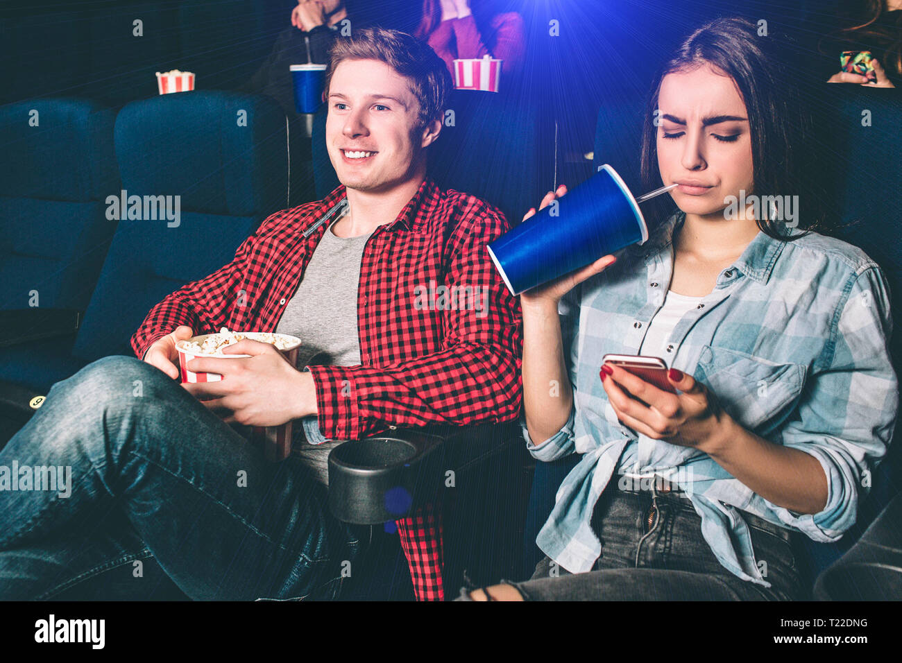 Bored movie audience hi-res stock photography and images - Alamy