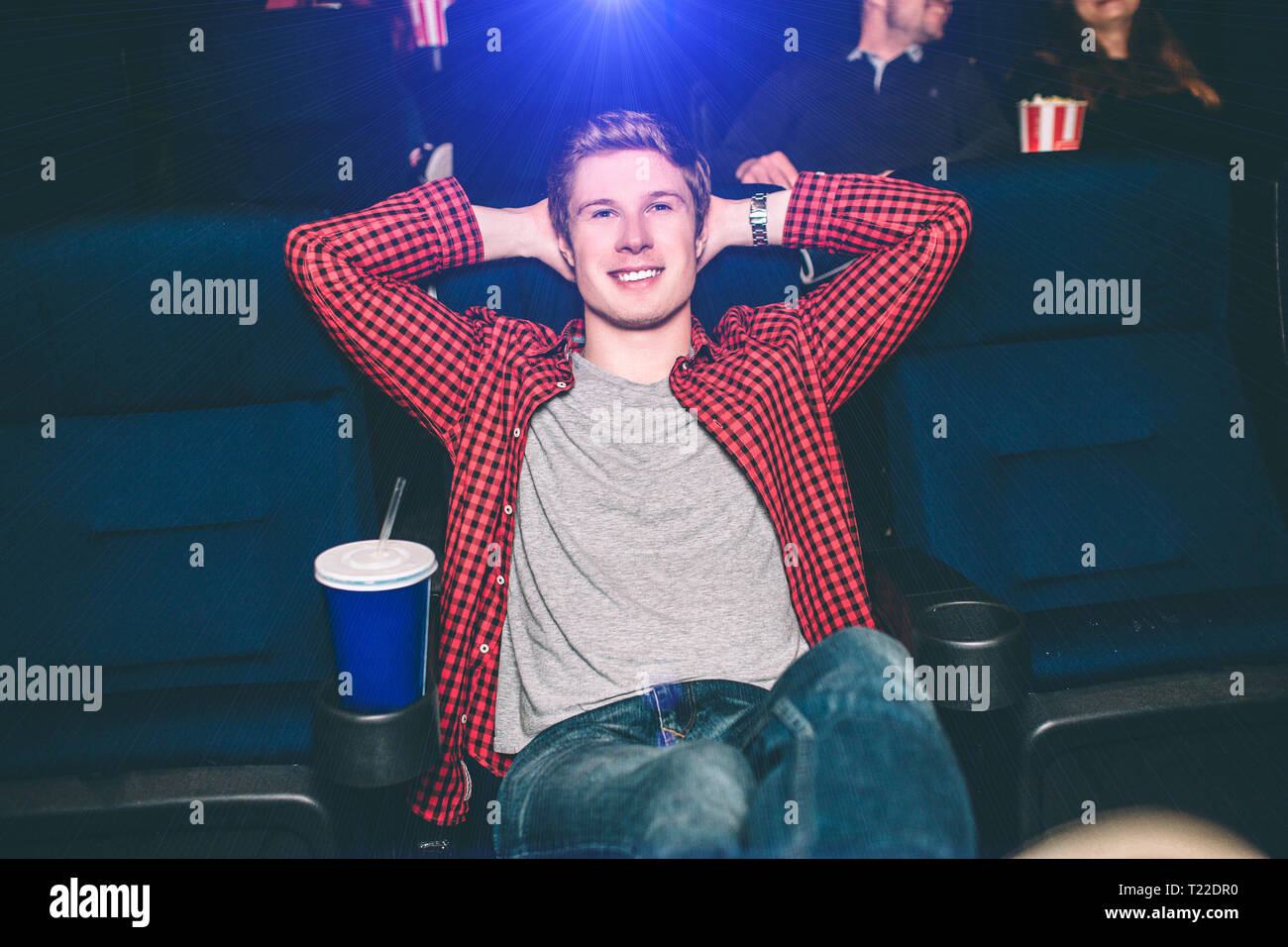 Leaning over chair hi-res stock photography and images - Alamy