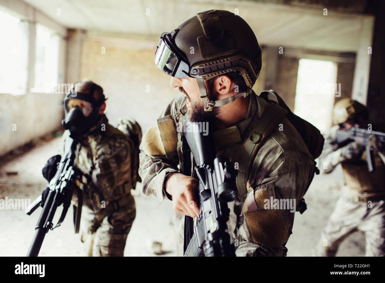 Commander is standing in a front and looking to his soldiers. They all ...