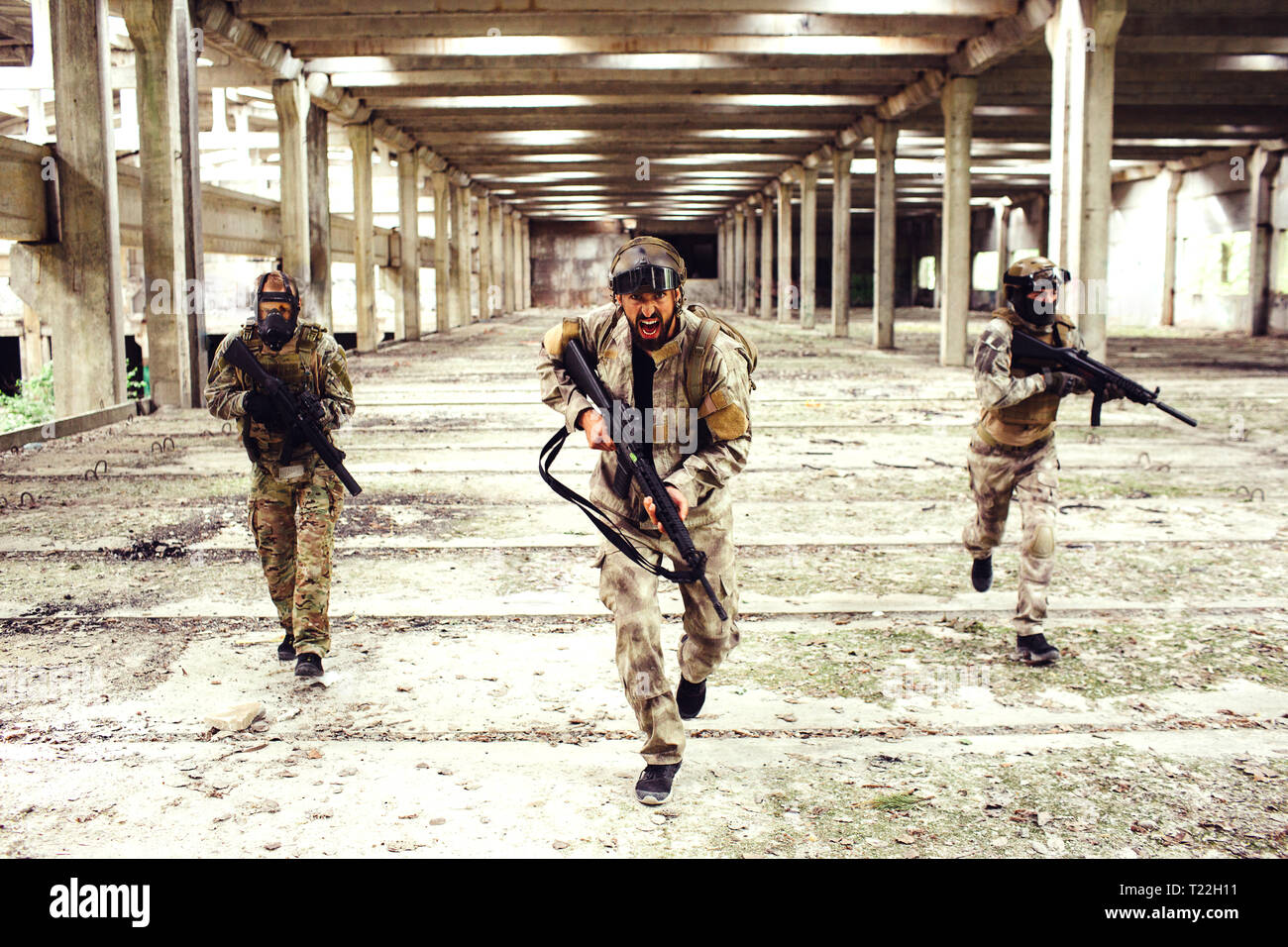 Black man running with gun hi-res stock photography and images - Alamy
