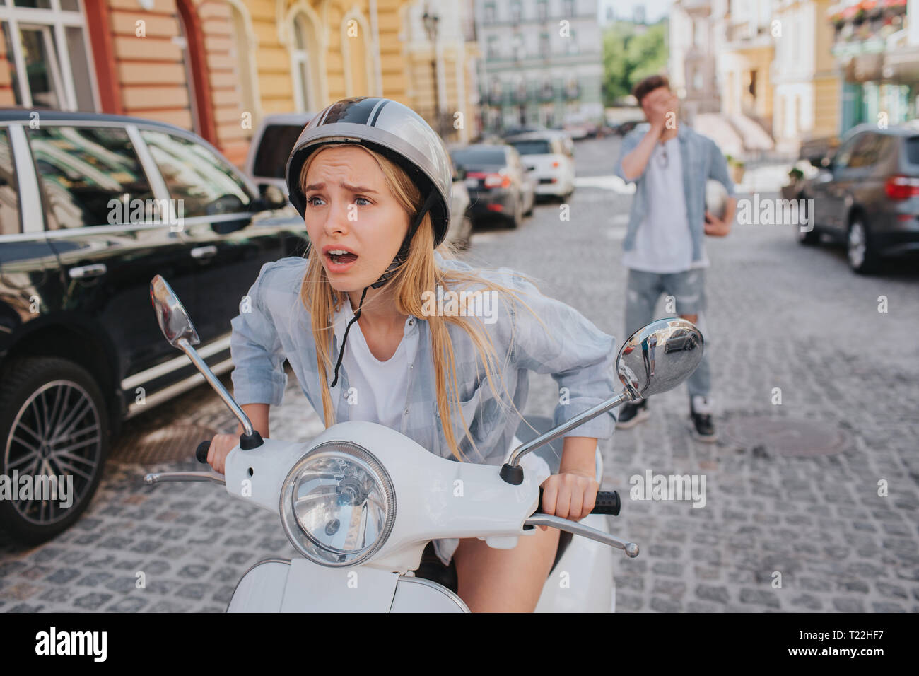 Woman sitting on back motorbike hi-res stock photography and images - Alamy