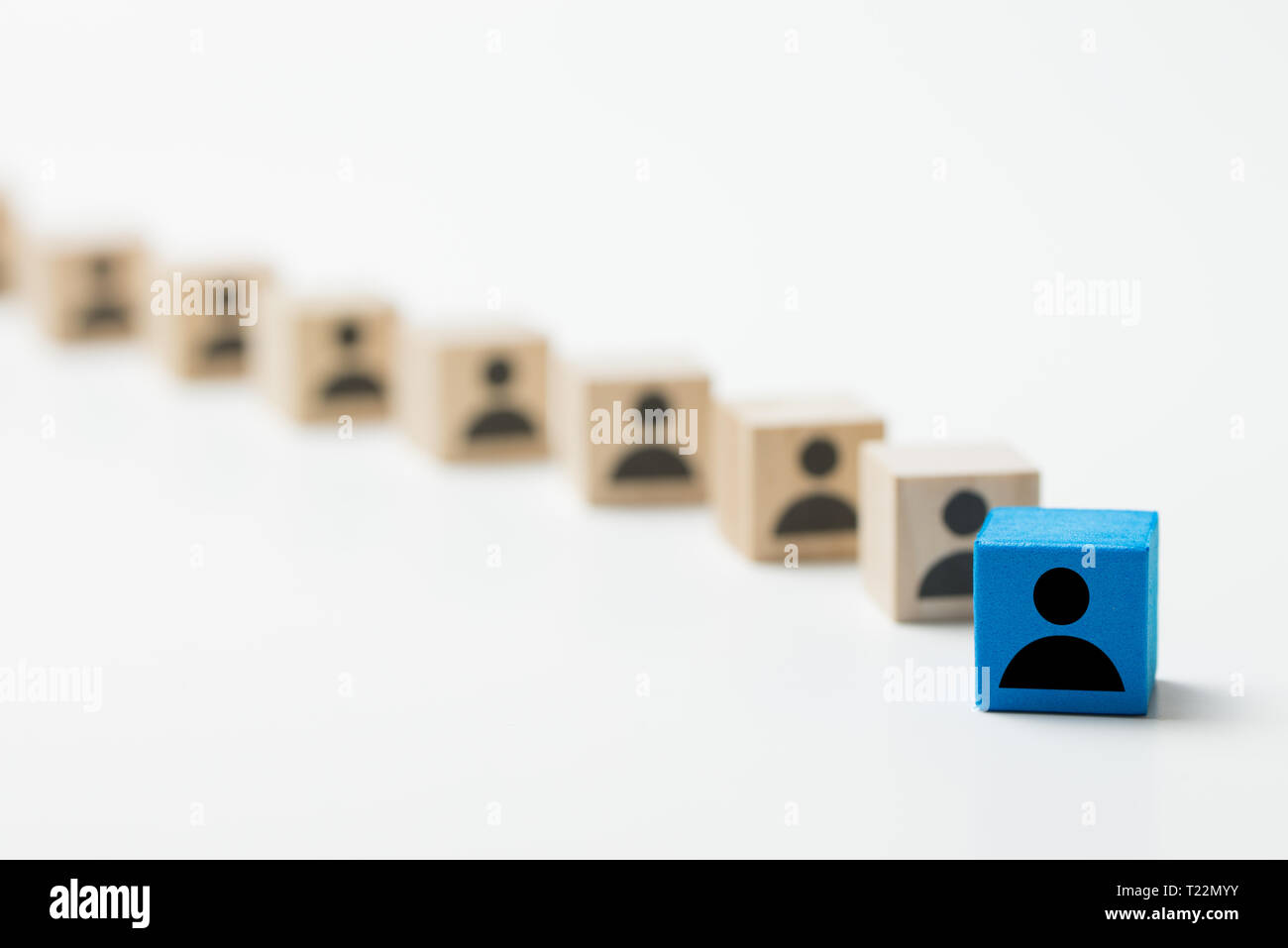 Leadership concept using blue people icon cube among other cubes Stock ...
