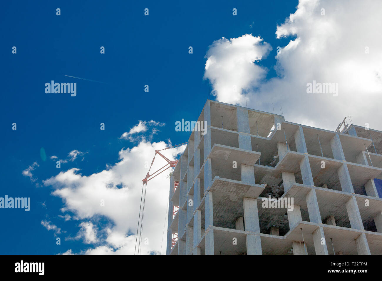 High-rise multi-storey buildings under construction. Tower cranes near ...