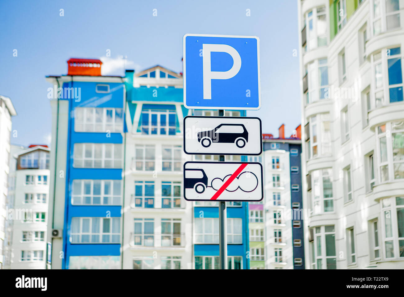 Road signs on a background of new home. Parking Stock Photo - Alamy