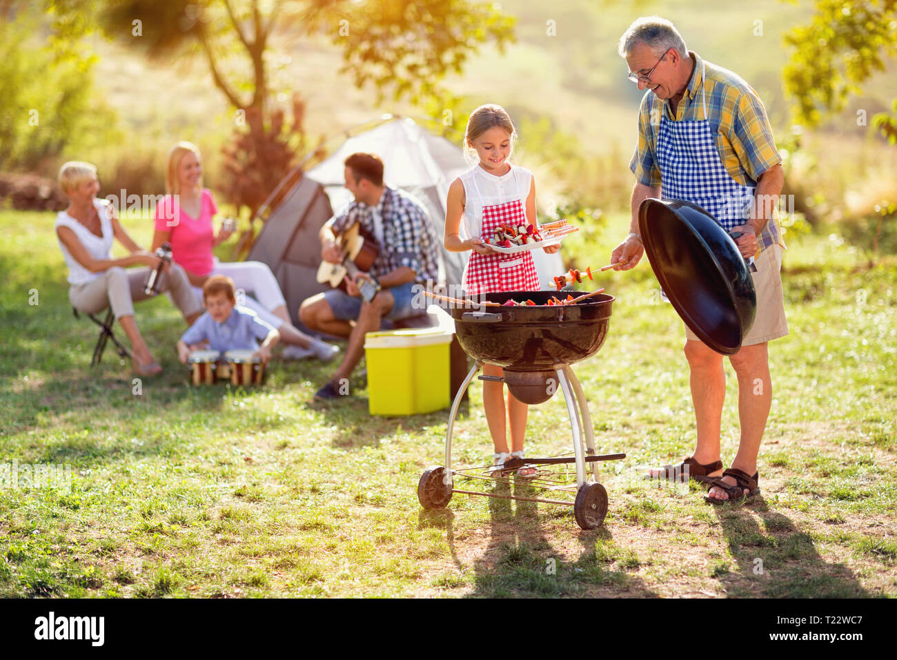 Camping family forest barbeque hi-res stock photography and images - Alamy
