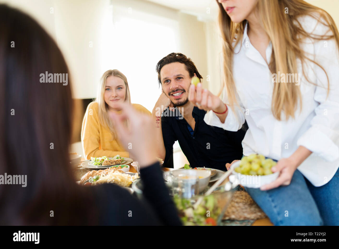 Friends having lunch together Stock Photo - Alamy
