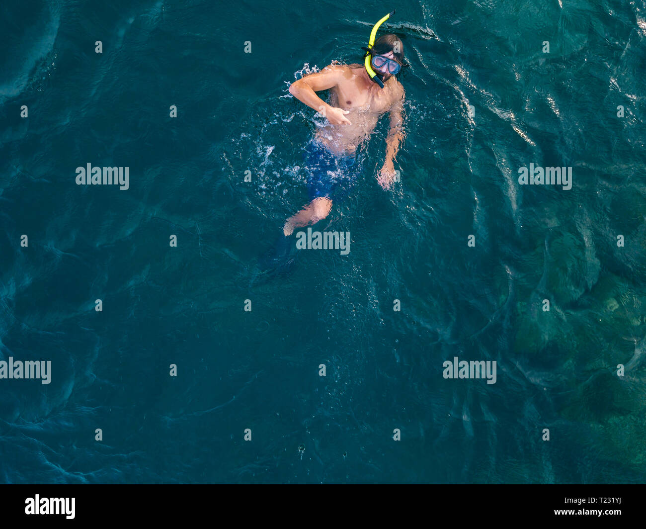 Man snorkeling in ocean Stock Photo - Alamy