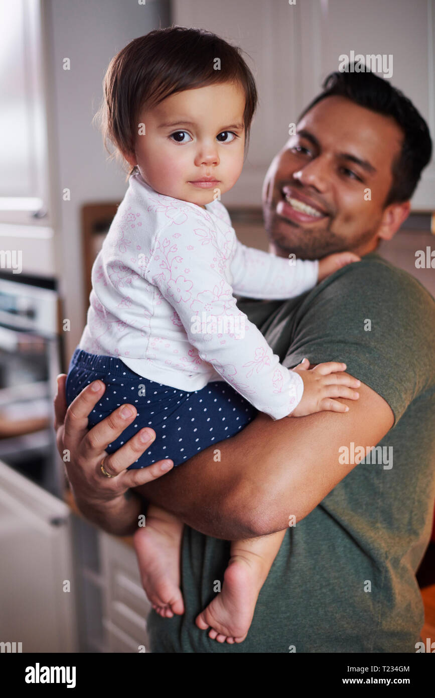 Portrait smiling father holding hi-res stock photography and images - Alamy