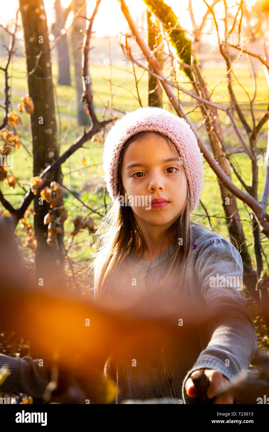 Young girl with woolly hat in autumn Stock Photo - Alamy