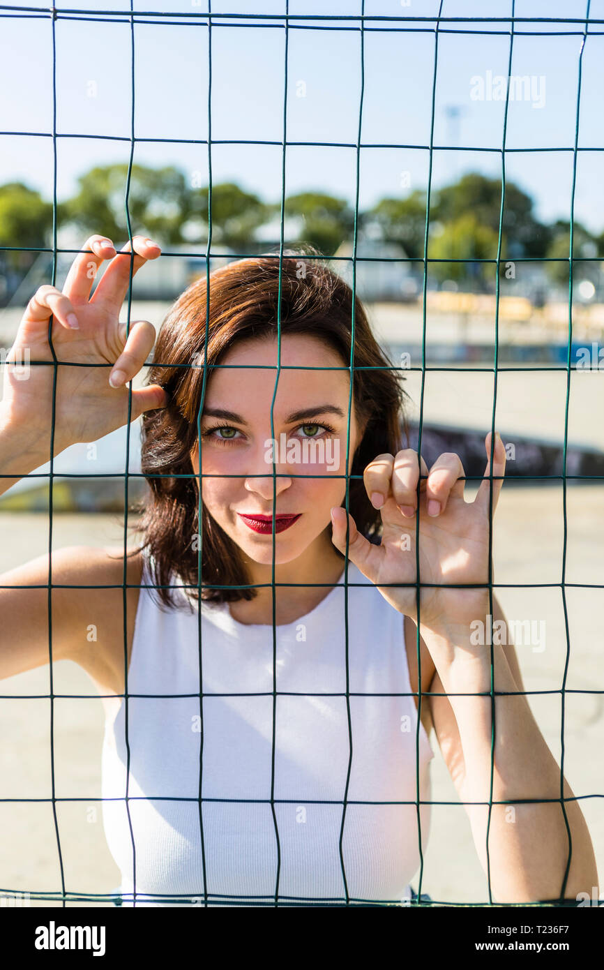 Behind fence hi-res stock photography and images - Alamy