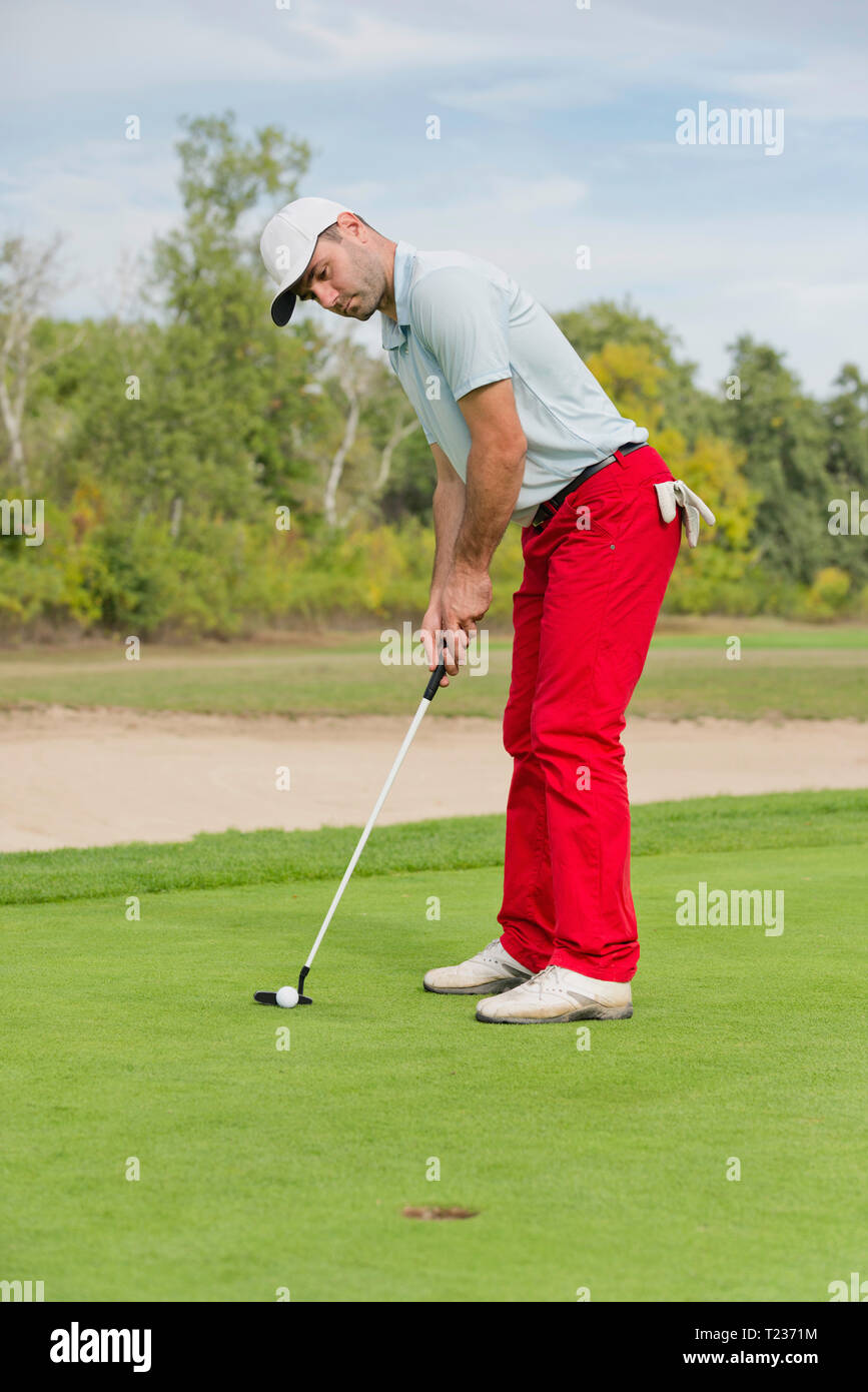 Golf club full length putting hi-res stock photography and images - Alamy