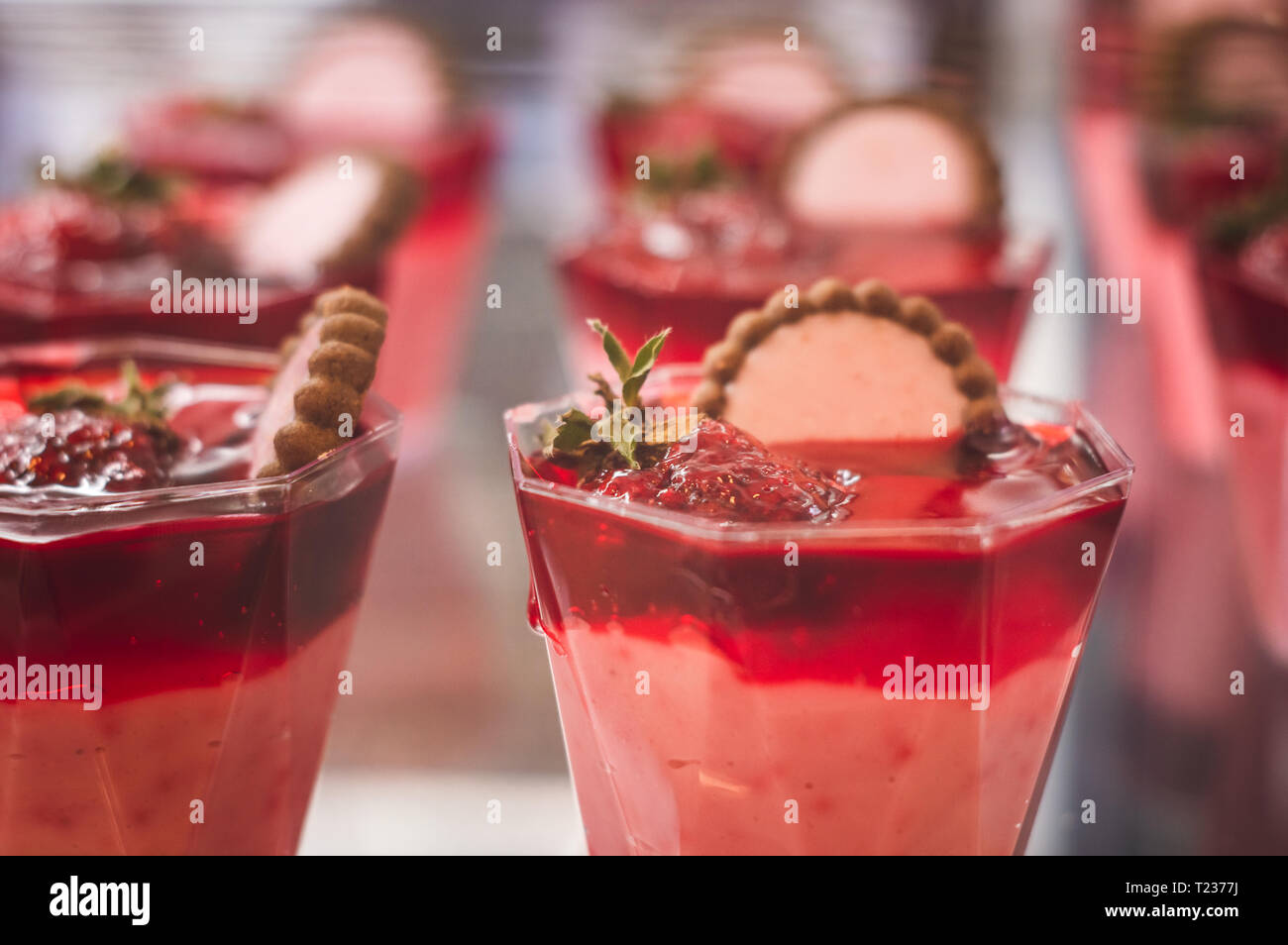 Strawberry desserts on display Stock Photo - Alamy