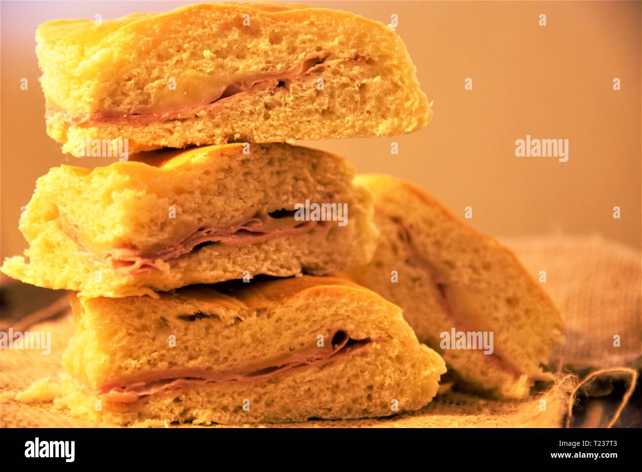 italian focaccia food with ham baked Stock Photo - Alamy