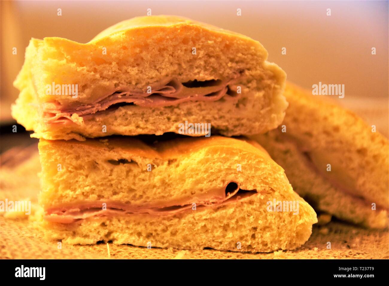 italian focaccia food with ham baked Stock Photo - Alamy