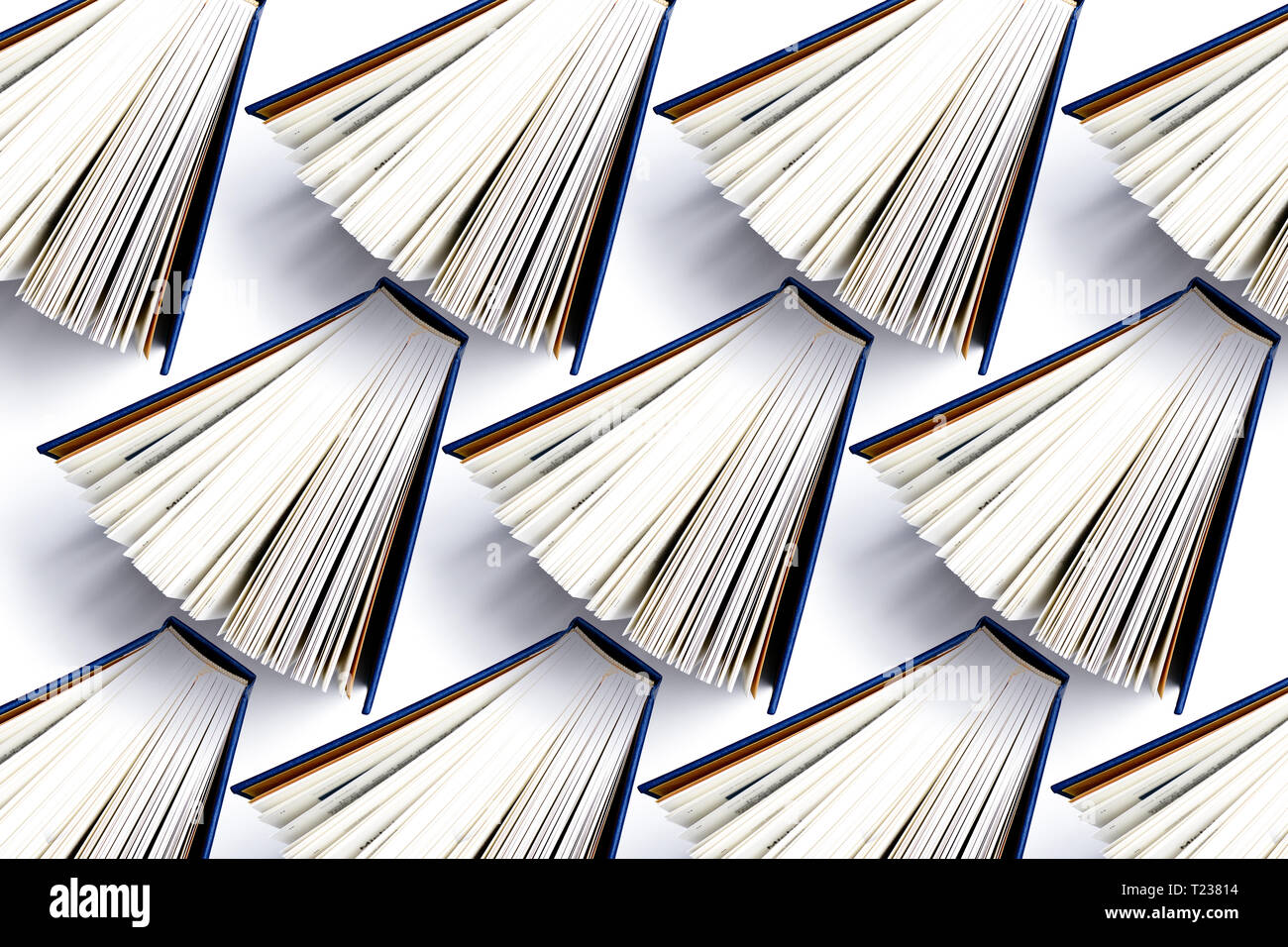 Open books form a pattern on white background Stock Photo - Alamy