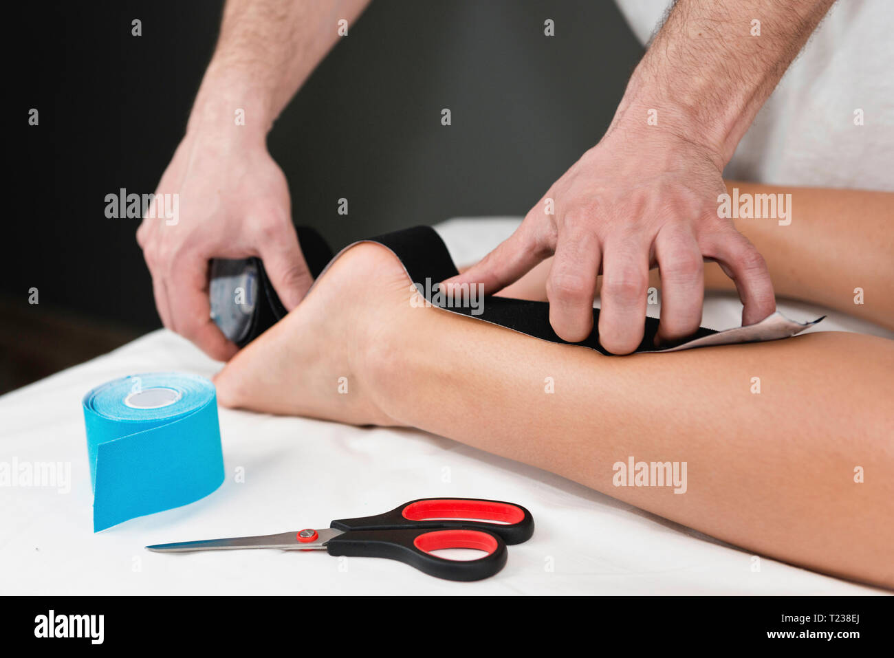 Taping in physical therapy Stock Photo - Alamy