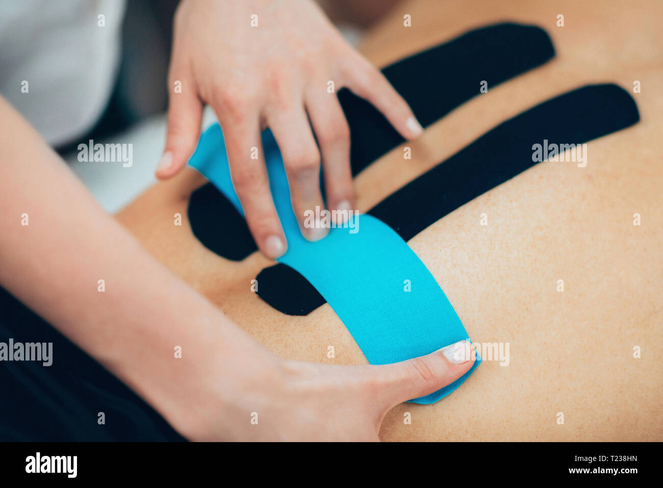 Human hands on knee hi-res stock photography and images - Alamy