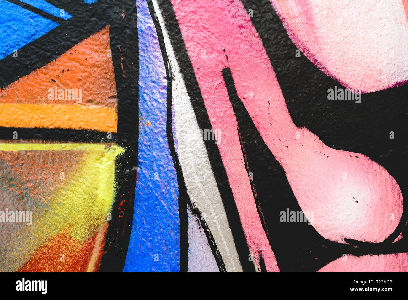 Detail of an anonymous street graffiti with many colors, cheerful urban ...