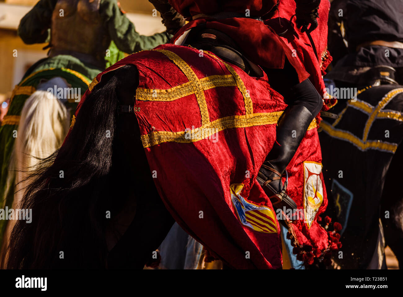 Detail of the armor of a knight mounted on horseback during a display ...