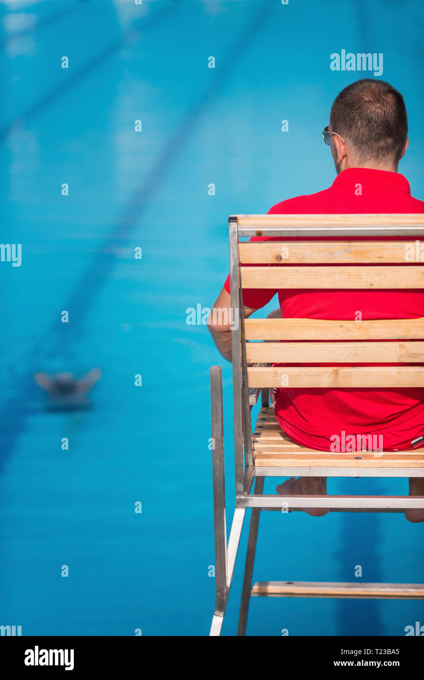 Pool lifeguard hi-res stock photography and images - Alamy