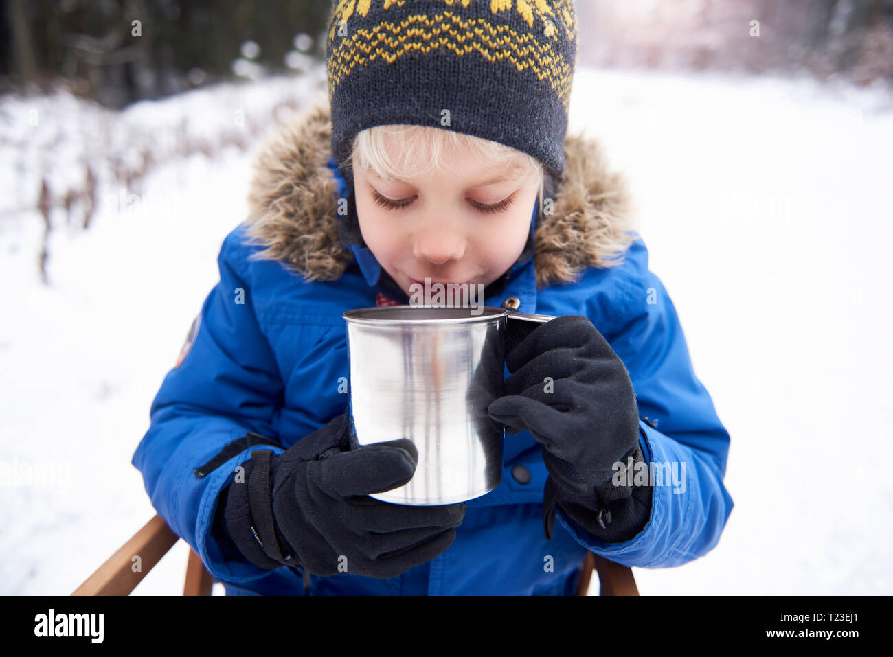 Little boy drinking tea hi-res stock photography and images - Alamy