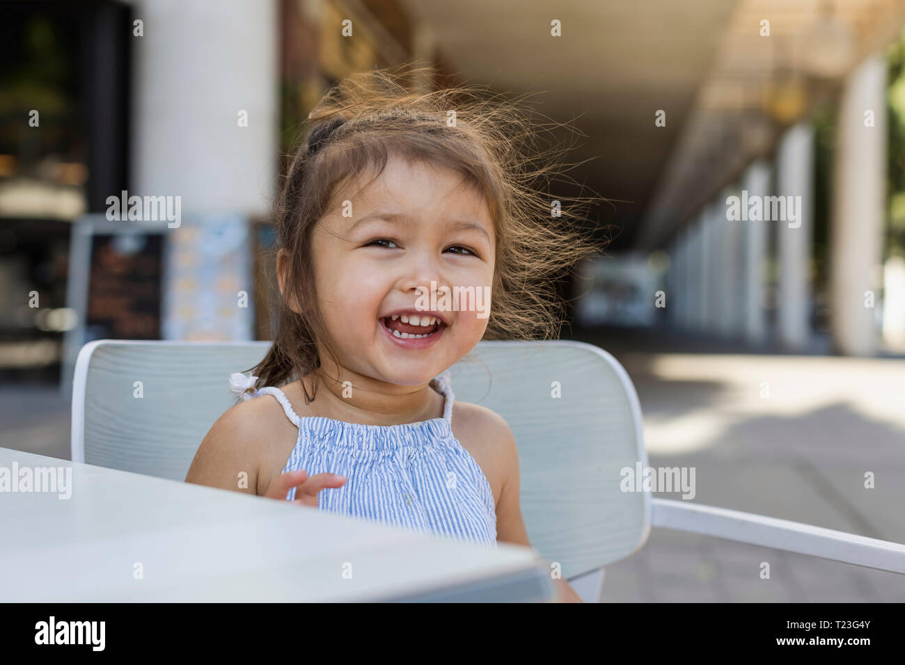 Portrait of happy little girl outdoors Stock Photo - Alamy