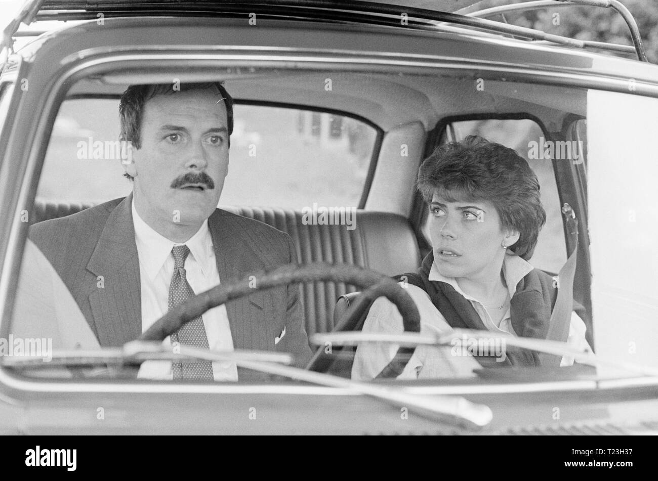 Clockwise (1986) John Cleese, Sharon Maiden, Date: 1986 Stock Photo - Alamy