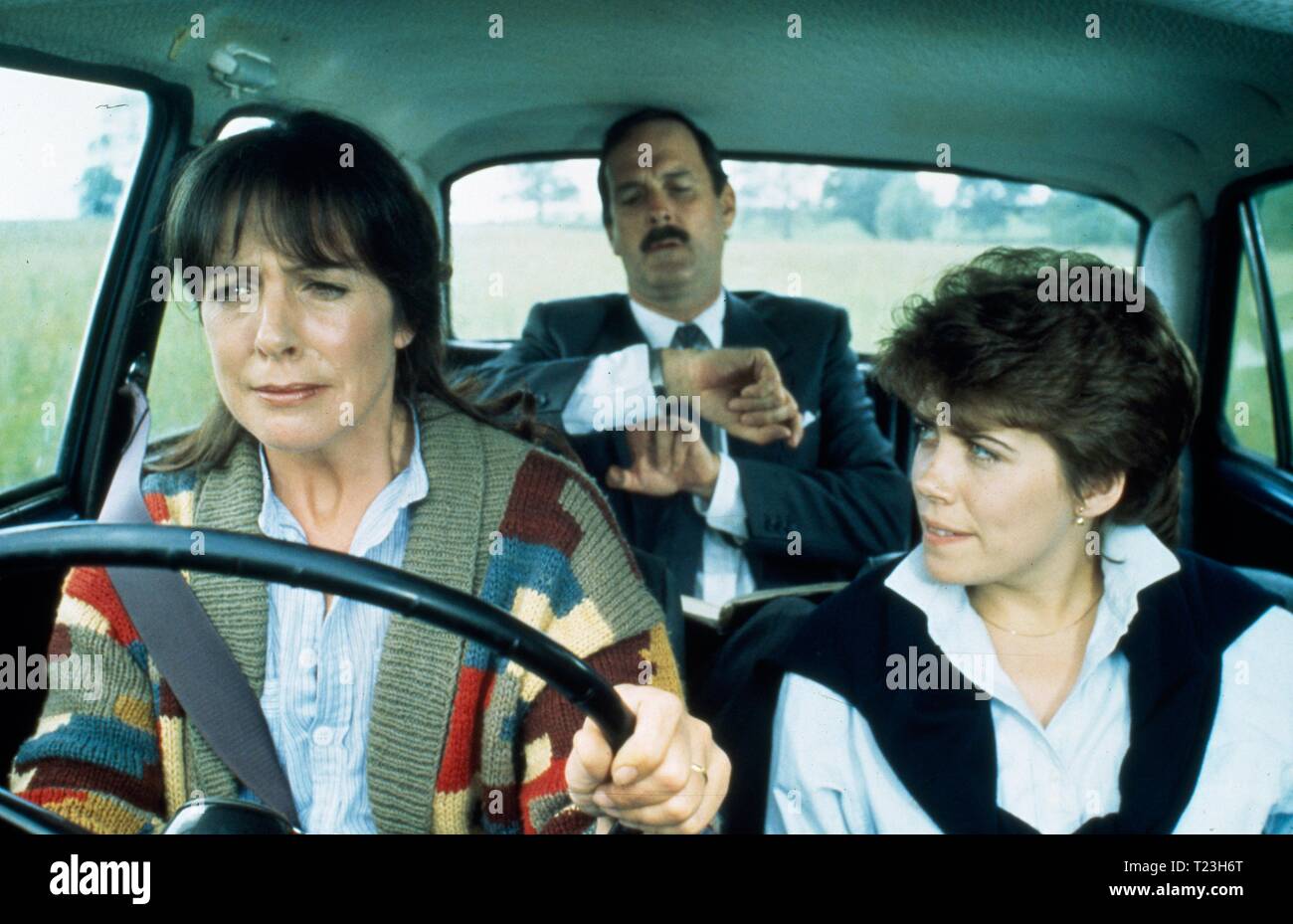 Clockwise (1986) John Cleese, Sharon Maiden, Date: 1986 Stock Photo - Alamy
