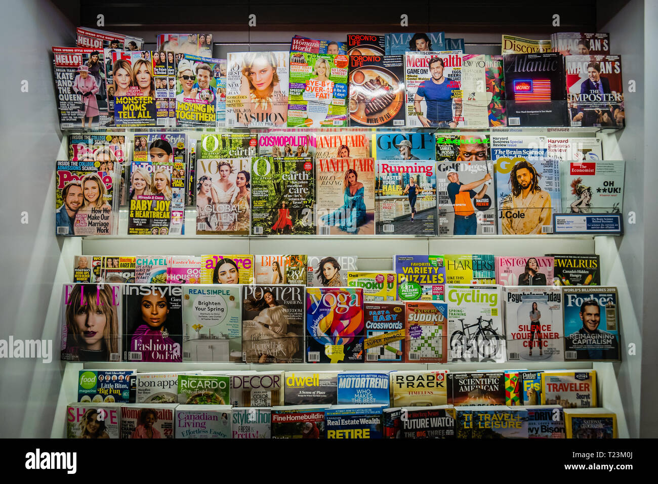 magazine section in a store Stock Photo - Alamy