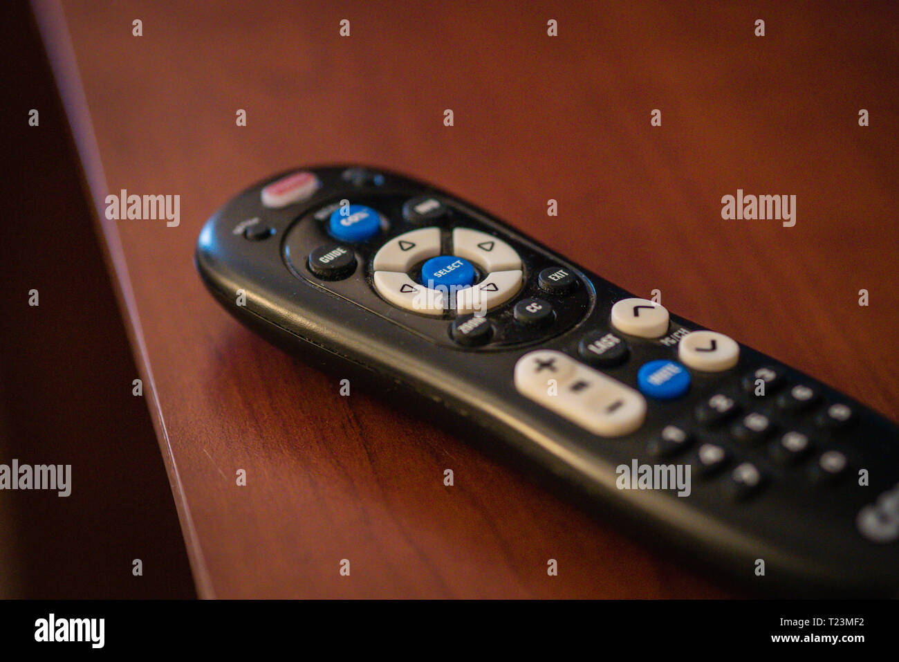 Wooden surface tv remote hi-res stock photography and images - Alamy