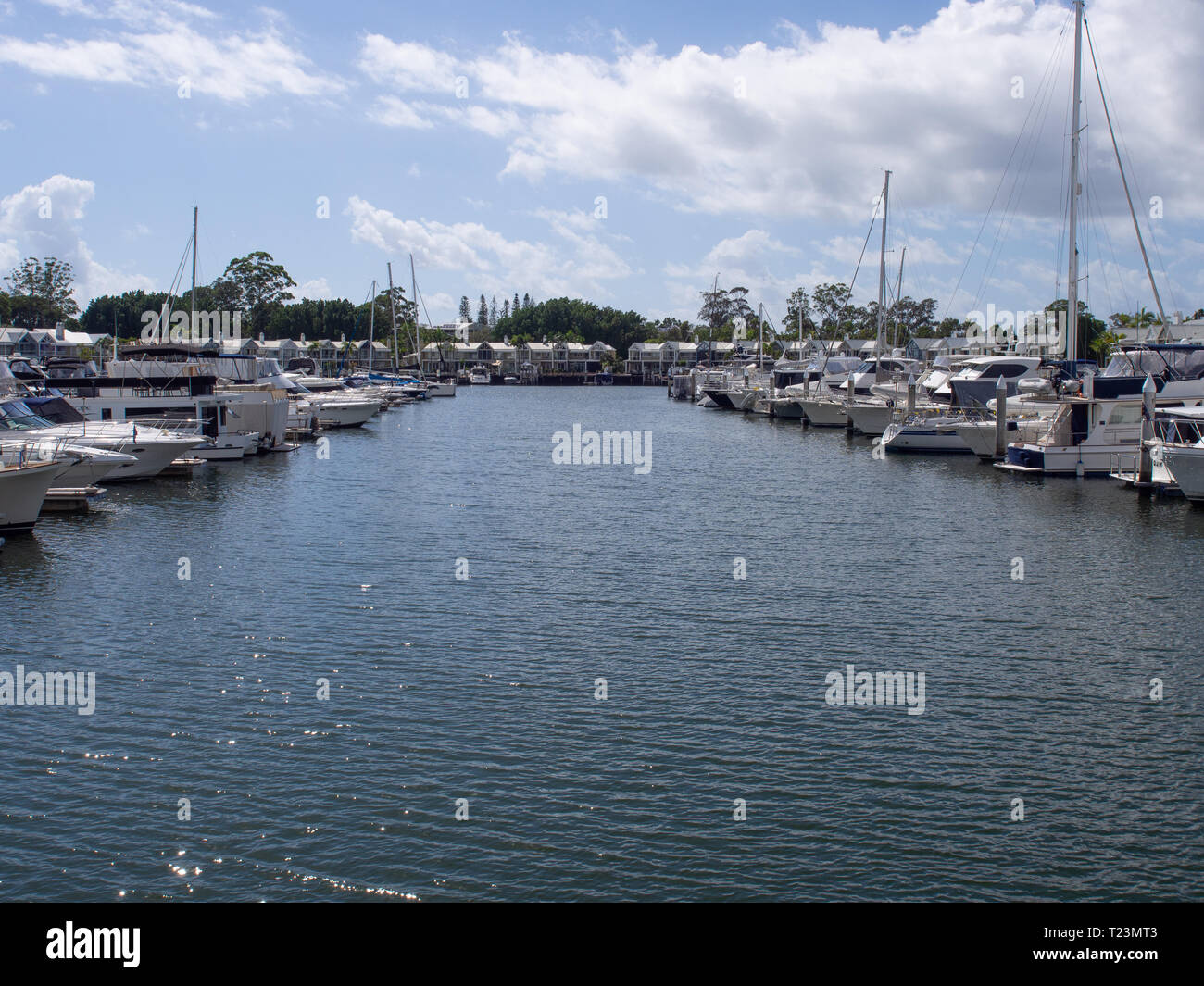 Boats In A Marina At Sanctuary Cove Stock Photo - Alamy