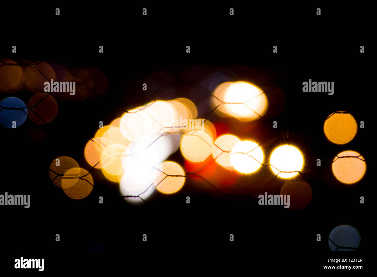 Fence at night Stock Photo - Alamy