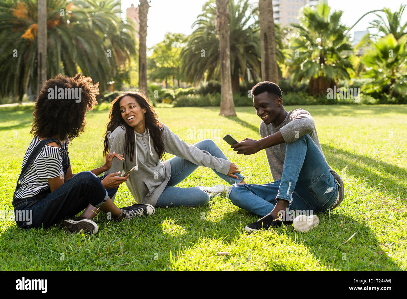 Friends having fun using hi-res stock photography and images - Alamy