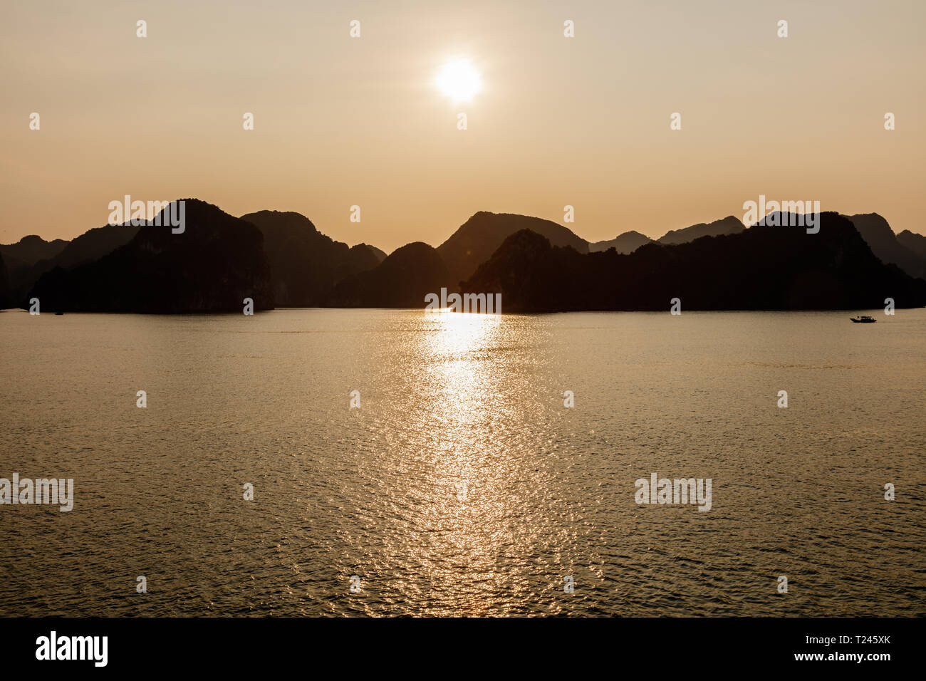 Halong Bay (Ha Long Bay) in Vietnam. Sunset time Stock Photo - Alamy
