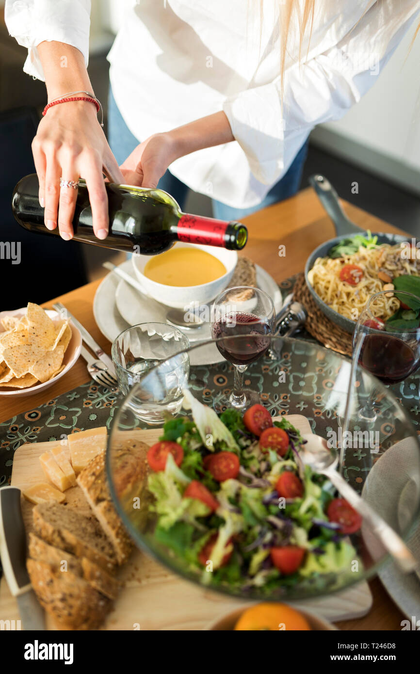 Woman at lunch table hi-res stock photography and images - Alamy