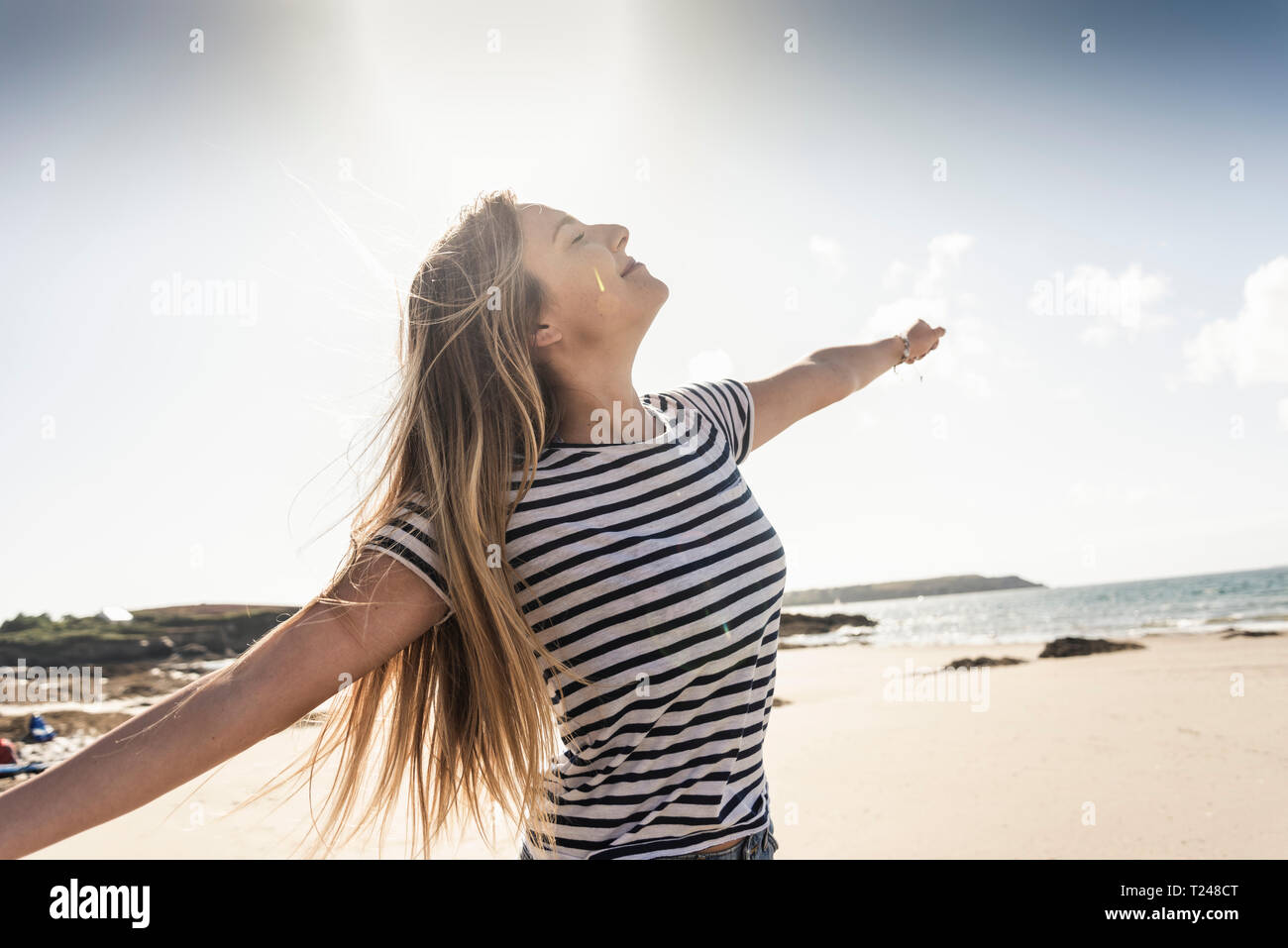 Woman dancing beach hi-res stock photography and images - Alamy