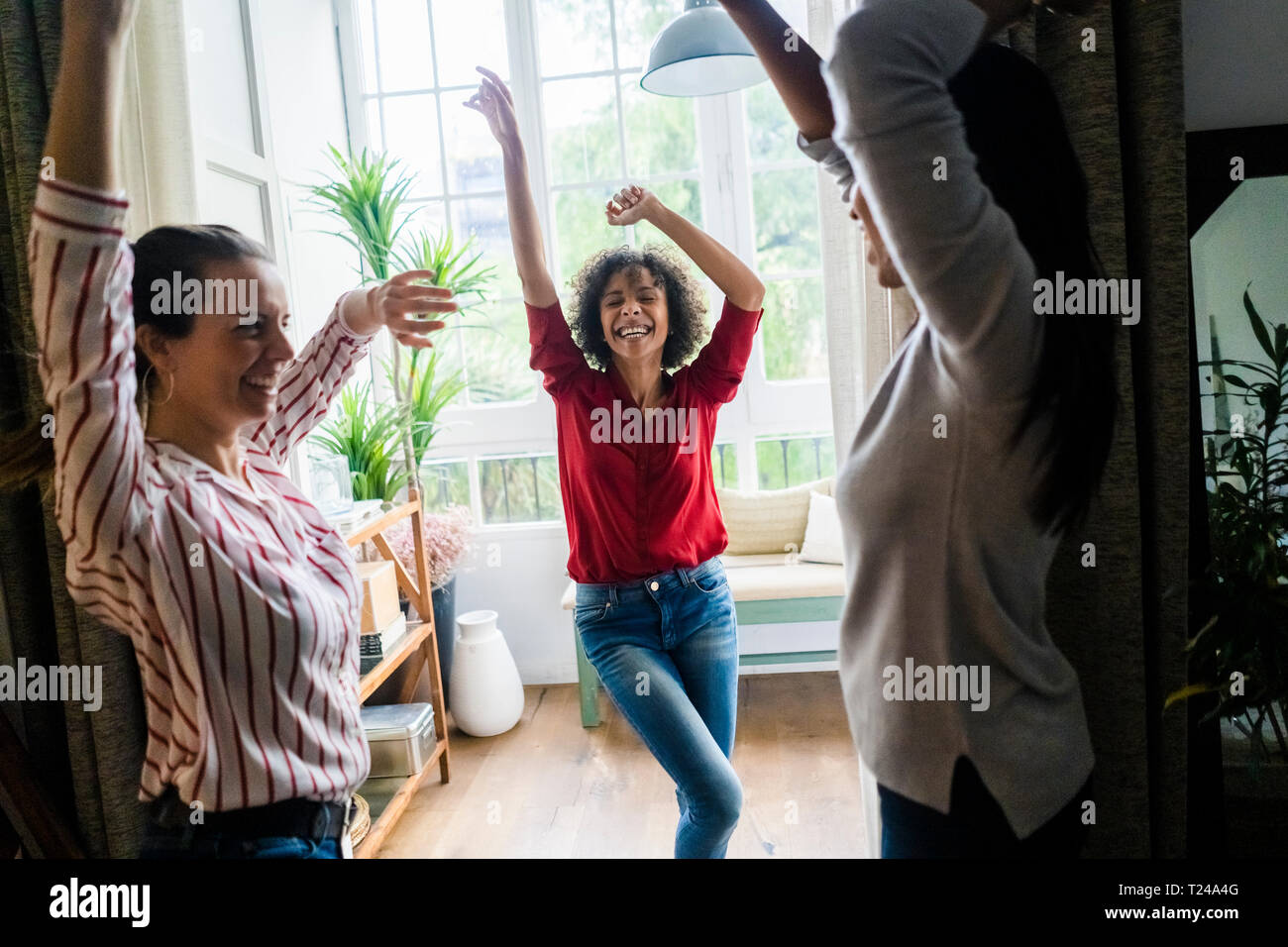 Three friends at home, living together Stock Photo - Alamy