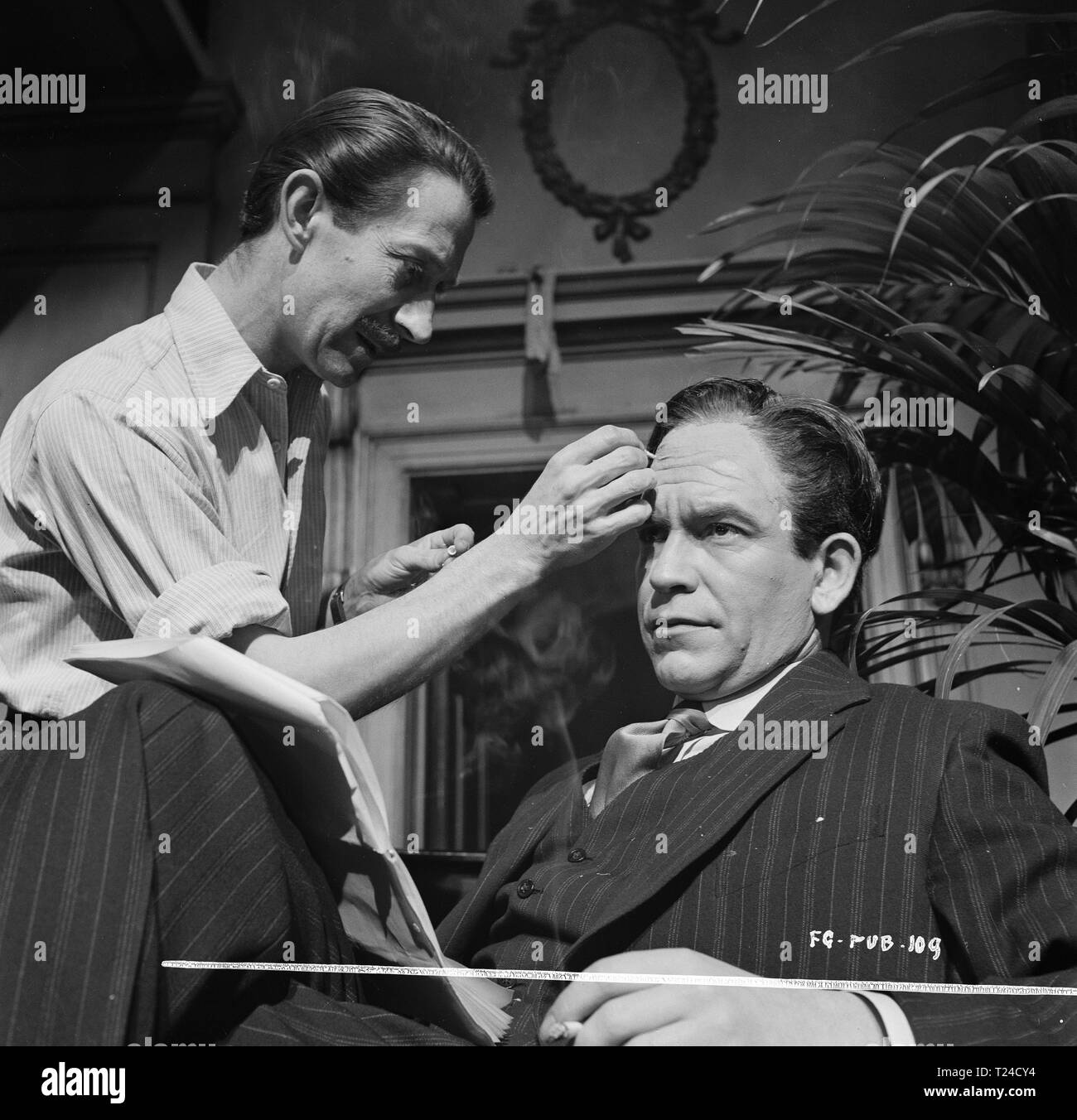The Magic Box (1952) Make-up artist working on Robert Beatty, Date ...