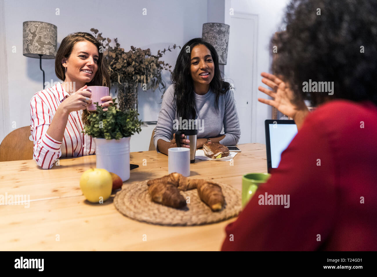 Three friends at home, living together Stock Photo - Alamy