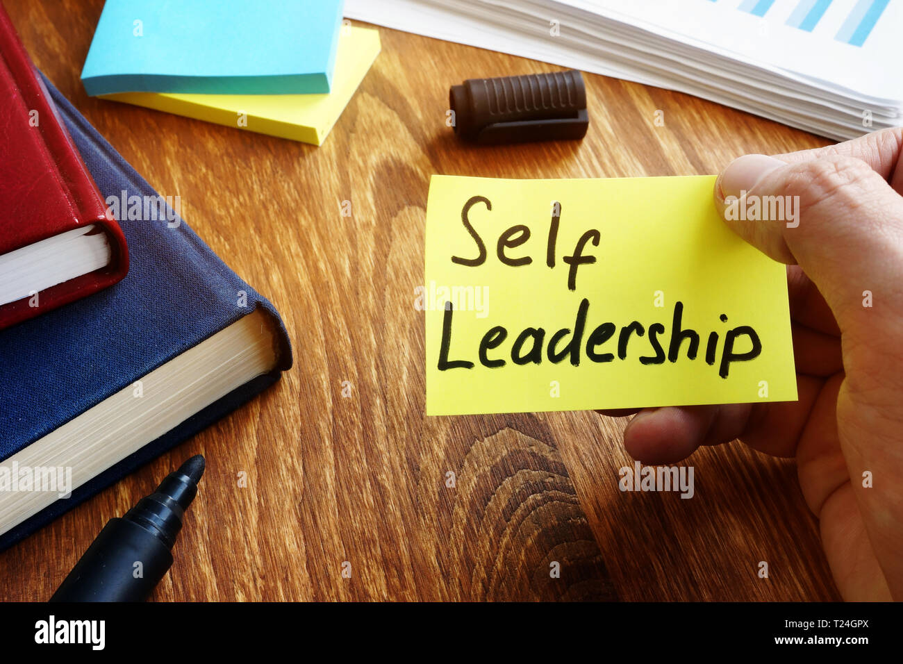 Self Leadership handwritten on piece of paper Stock Photo - Alamy