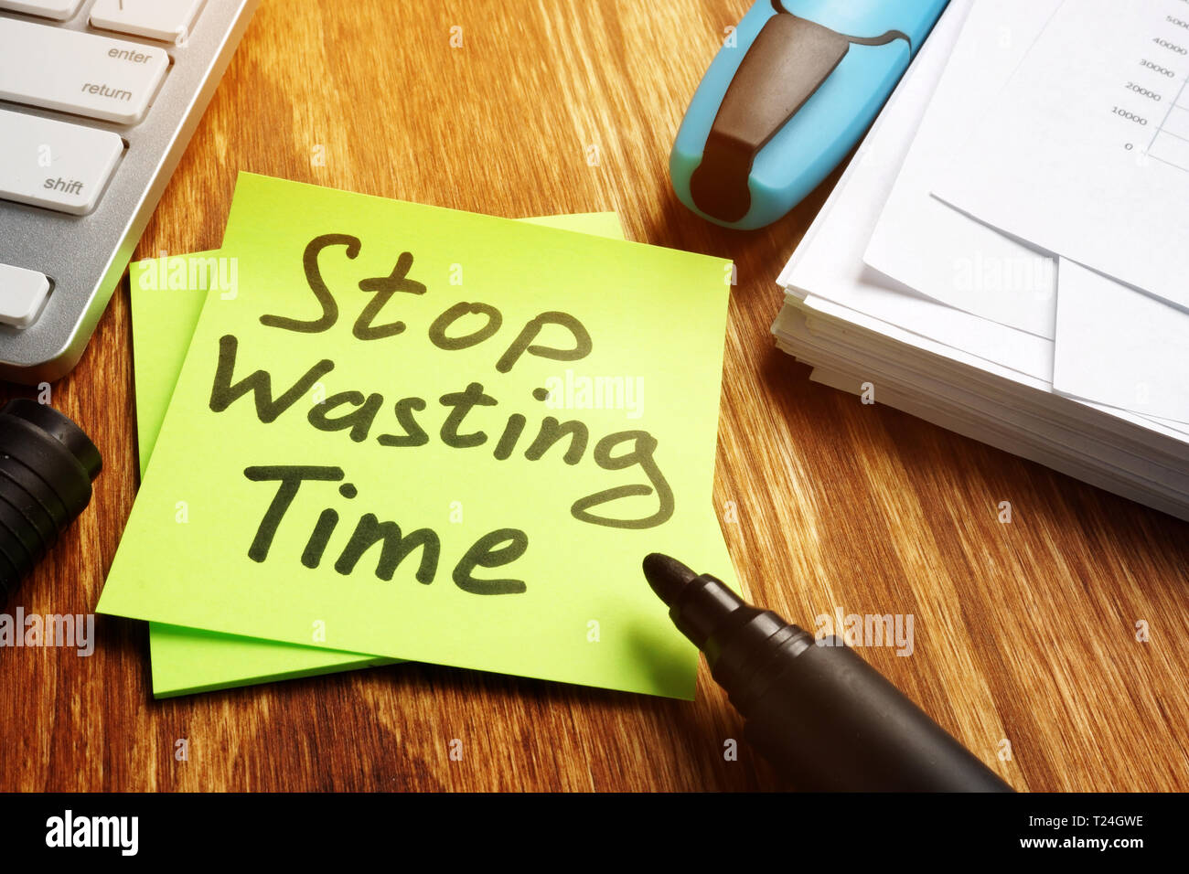 Stop wasting Time notice on a piece of paper Stock Photo - Alamy