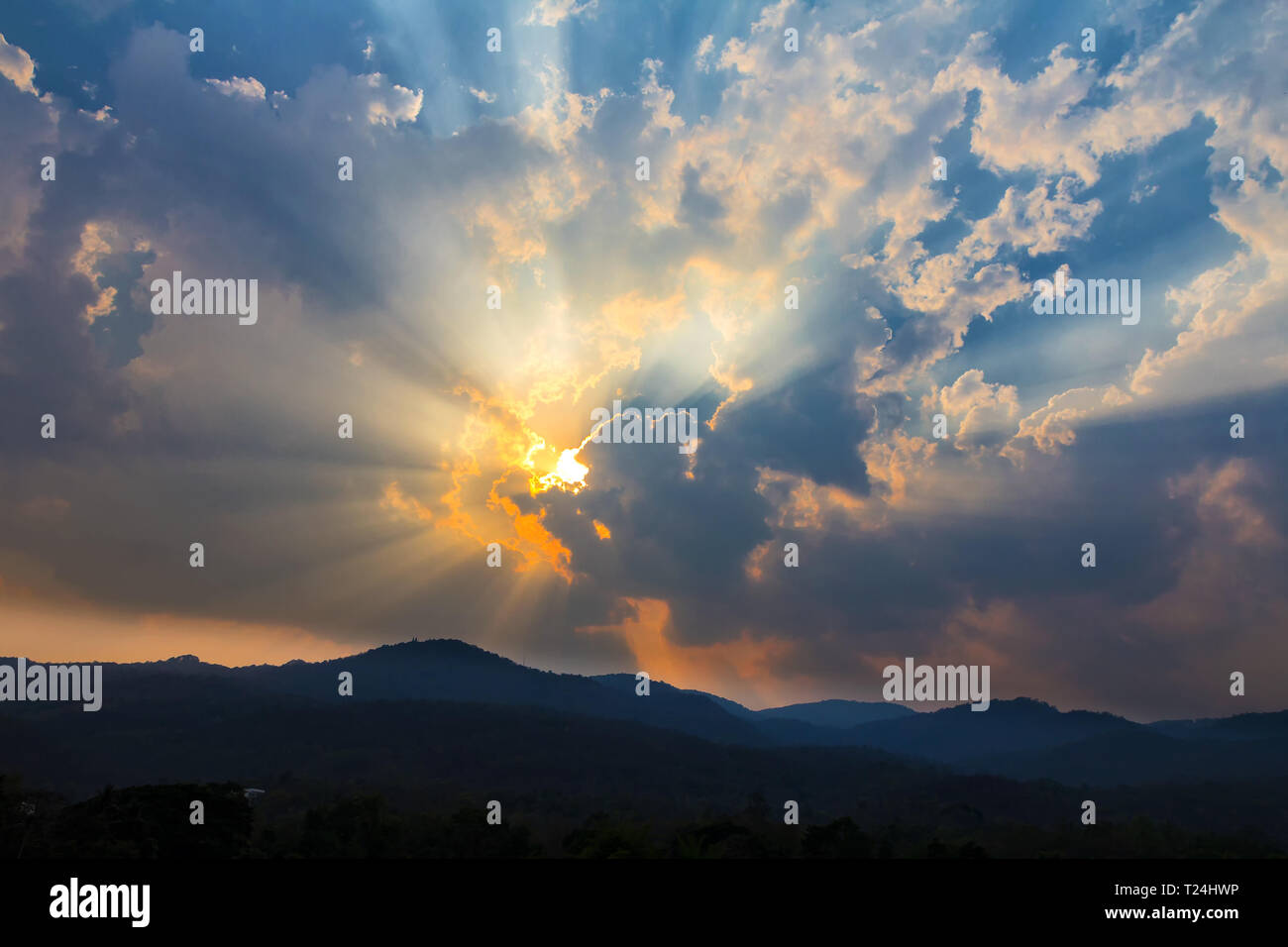 Beautiful sunrise or sunset with clouds and golden sunbeam over ...