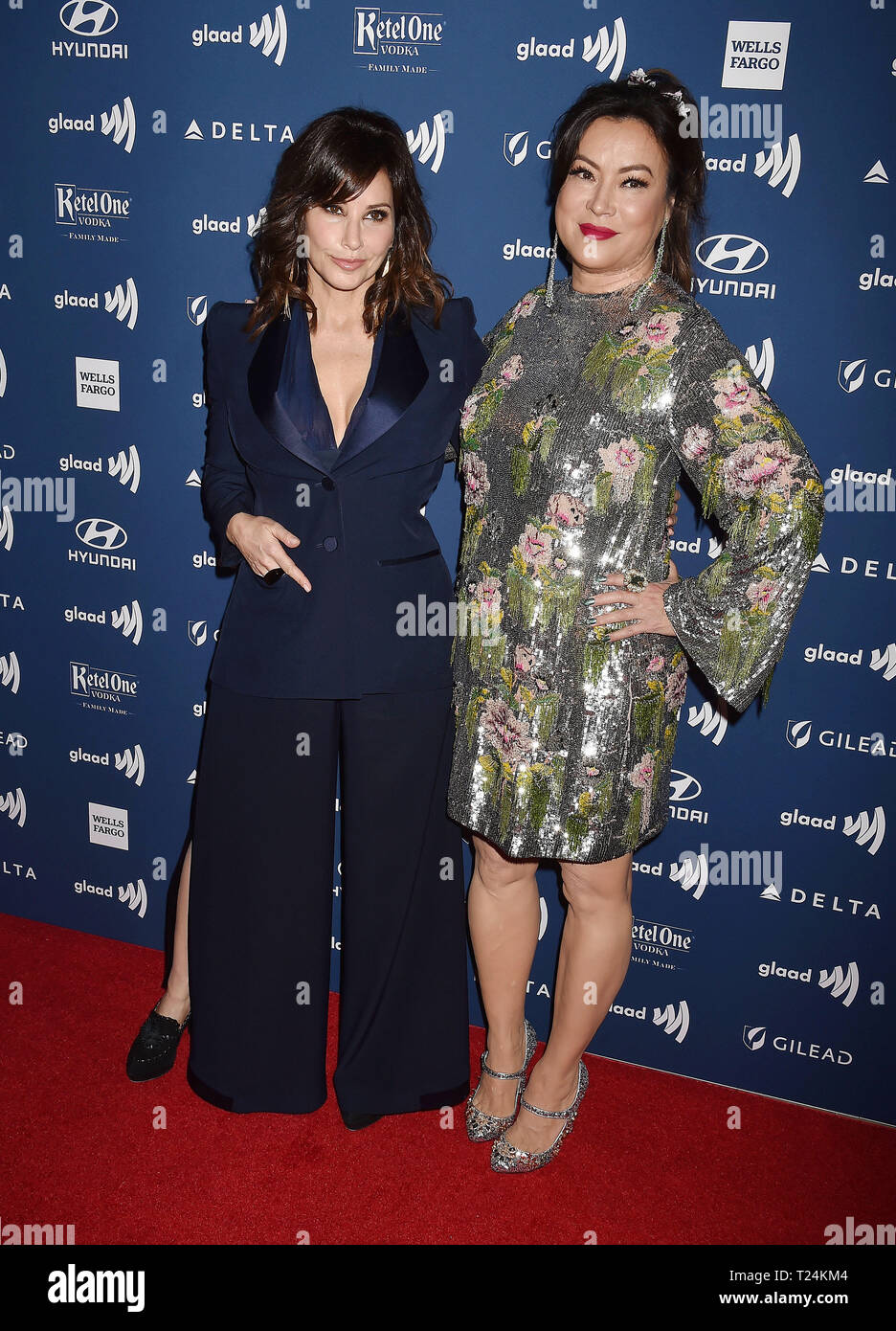 BEVERLY HILLS, CA - MARCH 28: Gina Gershon (L) and Jennifer Tilly ...