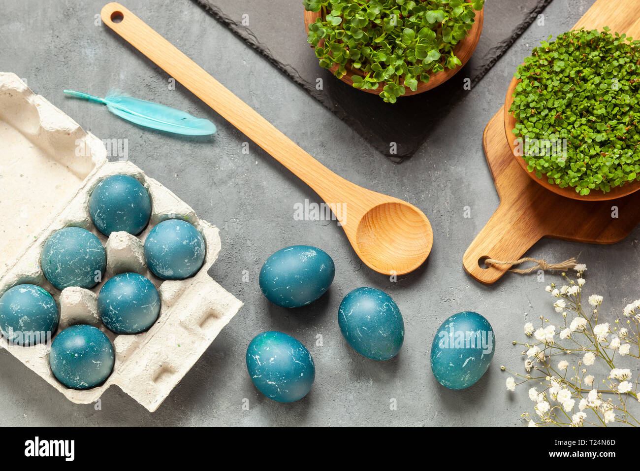 Easter composition - eggs naturally bred in blue with red cabbage Stock ...