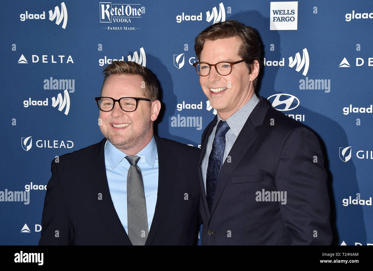 BEVERLY HILLS, CA - MARCH 28: Scott Icenogle (L) and Sean Hayes attend ...
