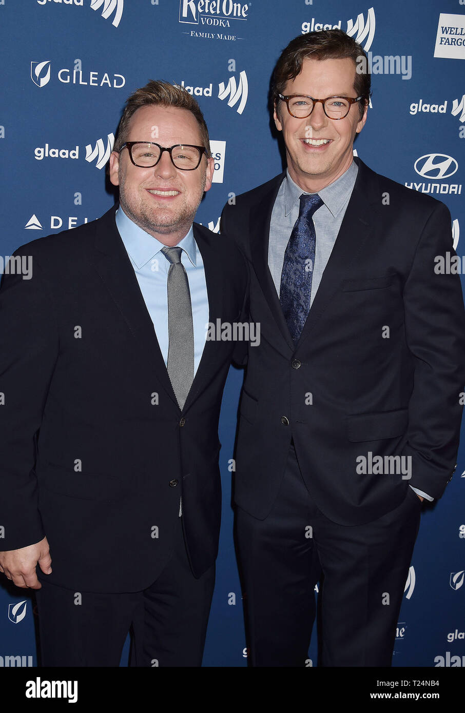 BEVERLY HILLS, CA - MARCH 28: Scott Icenogle (L) and Sean Hayes attend ...