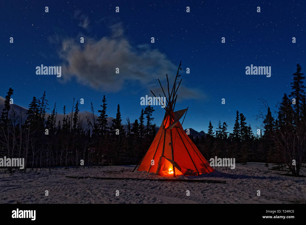 Teepee in the forest at night Stock Photo - Alamy