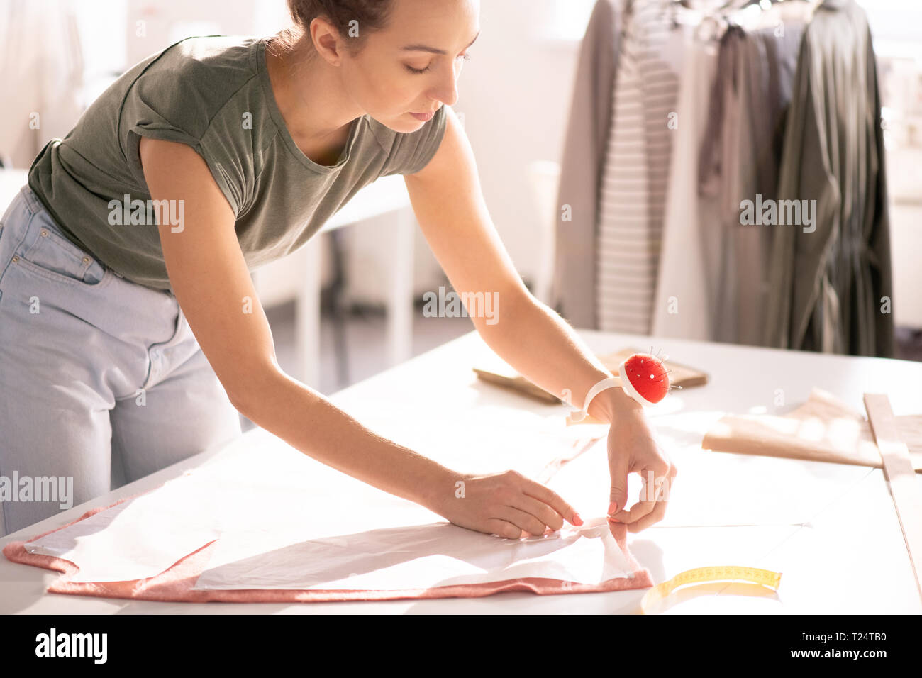 Woman bending over table hi-res stock photography and images - Alamy