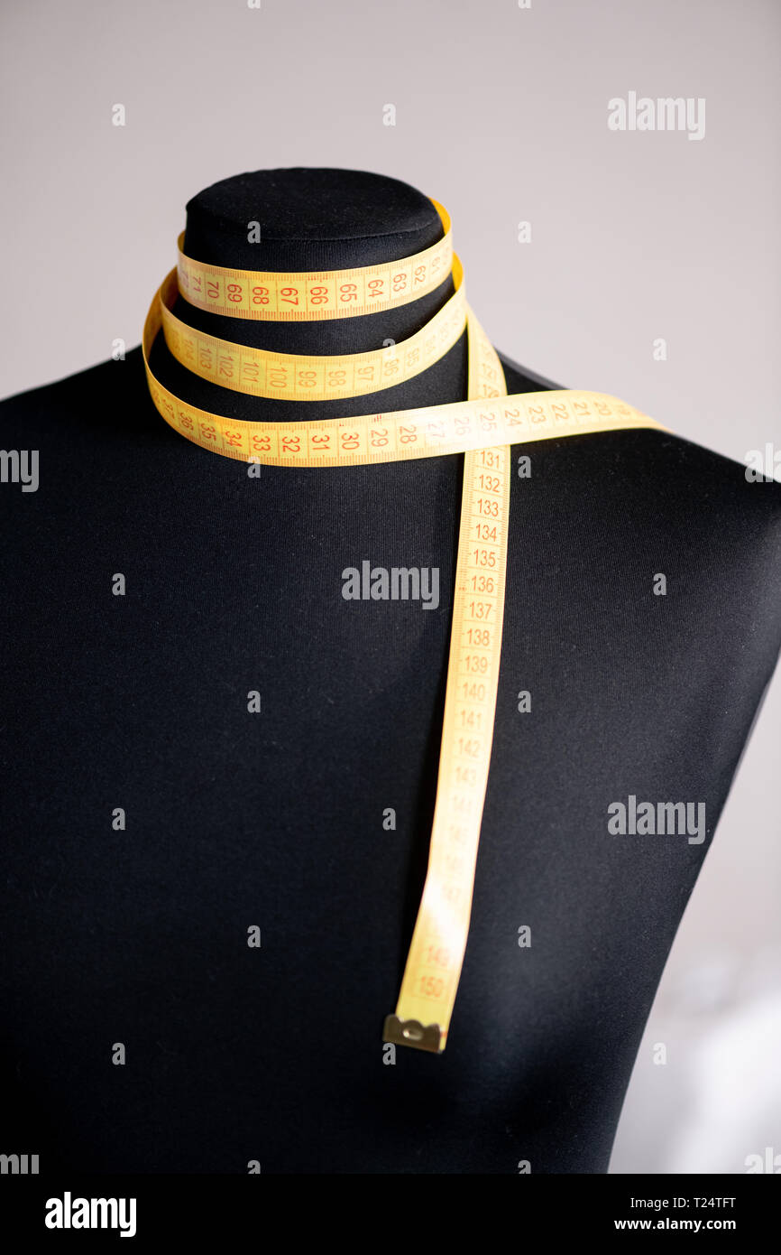 Fashion dummy with tape measure hi-res stock photography and images - Alamy